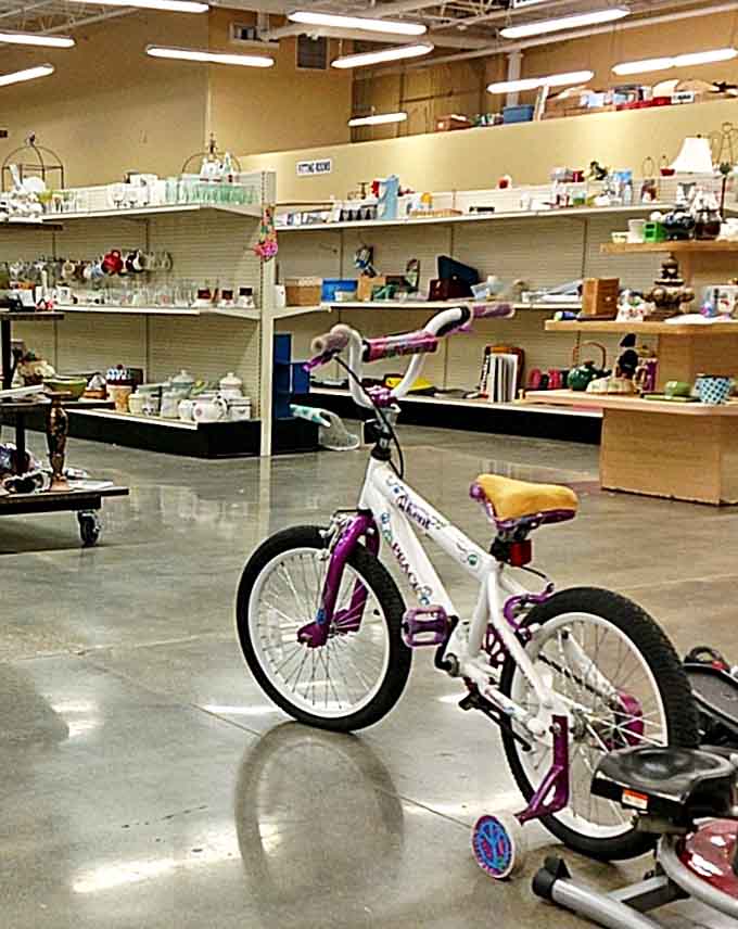 One child's outgrown bicycle becomes another's first taste of freedom, training wheels included at no extra charge.