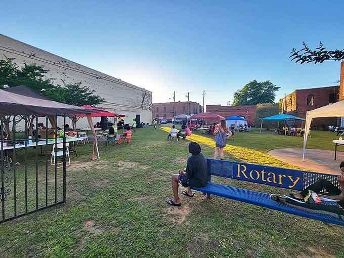 Community gatherings under Alabama skies&mdash;where neighbors become friends and strangers don't stay strangers for long. The Rotary bench says it all.