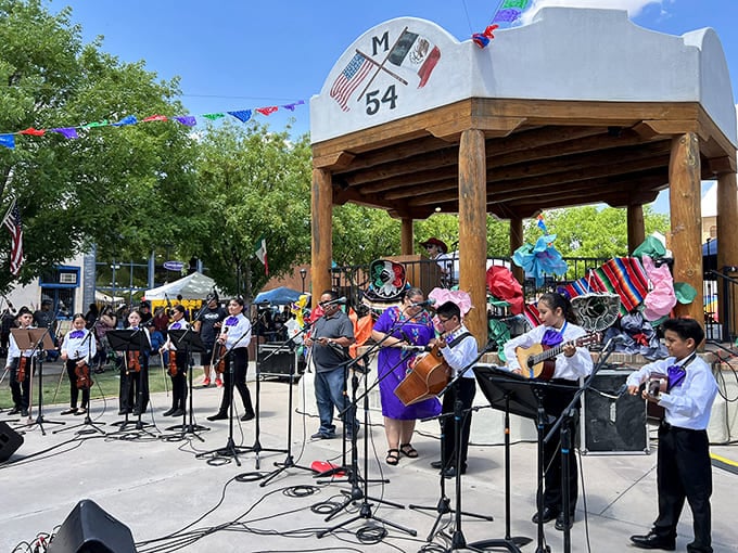 Local musicians keep traditions alive under the plaza gazebo, where mariachi melodies float through the air like the scent of roasting chiles.