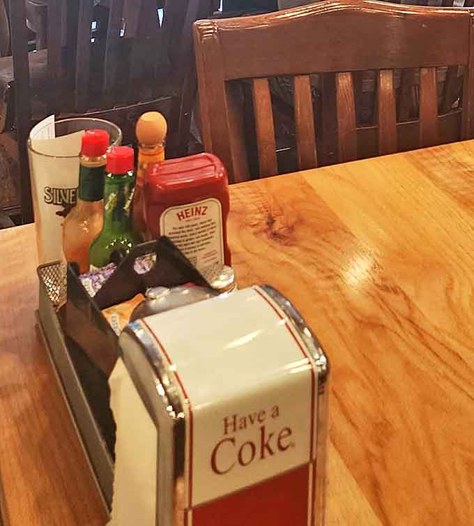 Classic condiment caddies &ndash; the unsung heroes of diner tables everywhere, ready to customize your meal to perfection.