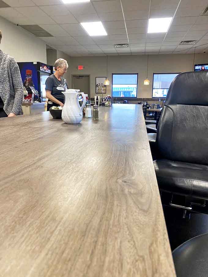 The counter&mdash;where solo diners find community, coffee cups are never empty, and the day's news gets thoroughly dissected.