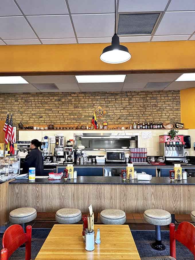 The command center where breakfast dreams become reality. Those flags aren't just decoration&mdash;they're a hint at the international breakfast journey awaiting you.