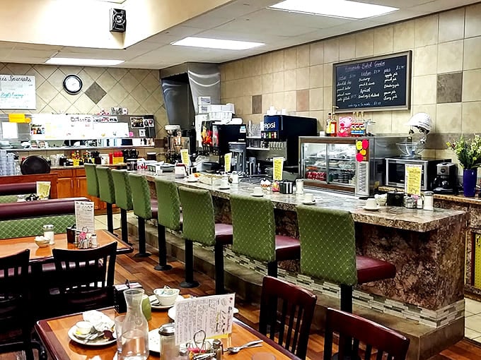 The counter seating isn't just efficient&mdash;it's front-row tickets to the greatest show in town: breakfast in the making.