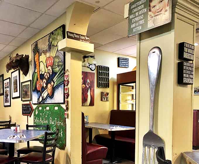 Wall art that tells stories of Alaska while that giant fork reminds you of the serious eating business at hand. Priorities perfectly aligned.