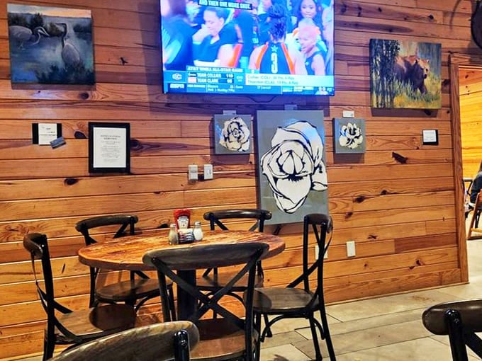 Local art and wooden walls create a gallery of Louisiana culture&mdash;visual appetizers before the main courses arrive.