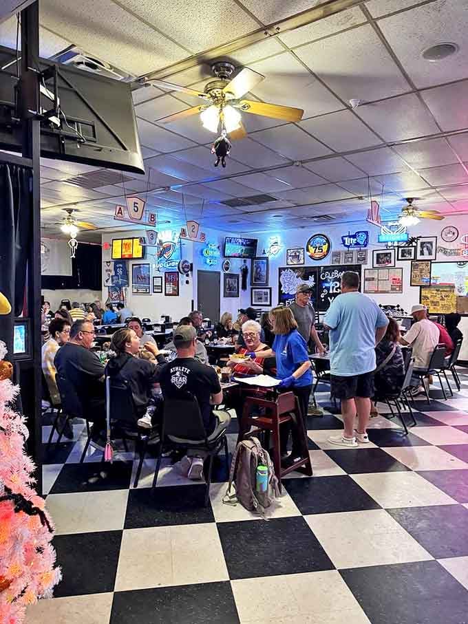 Where strangers become friends over shared chicken and cold beer. The checkered floor might be black and white, but the experiences here are technicolor.