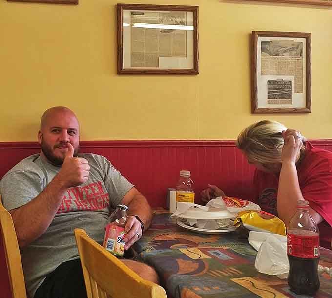 The universal language of sandwich satisfaction&mdash;a thumbs up that says more than words ever could.