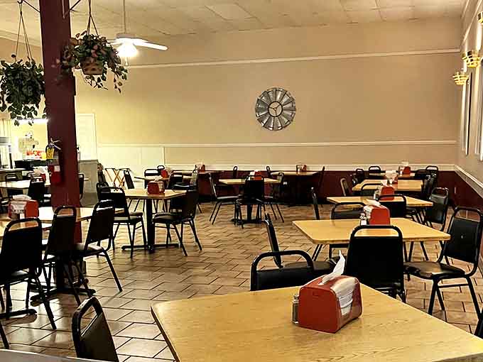 Empty tables waiting for the lunch rush tell a story of countless conversations, celebrations, and everyday meals that have unfolded in this space.