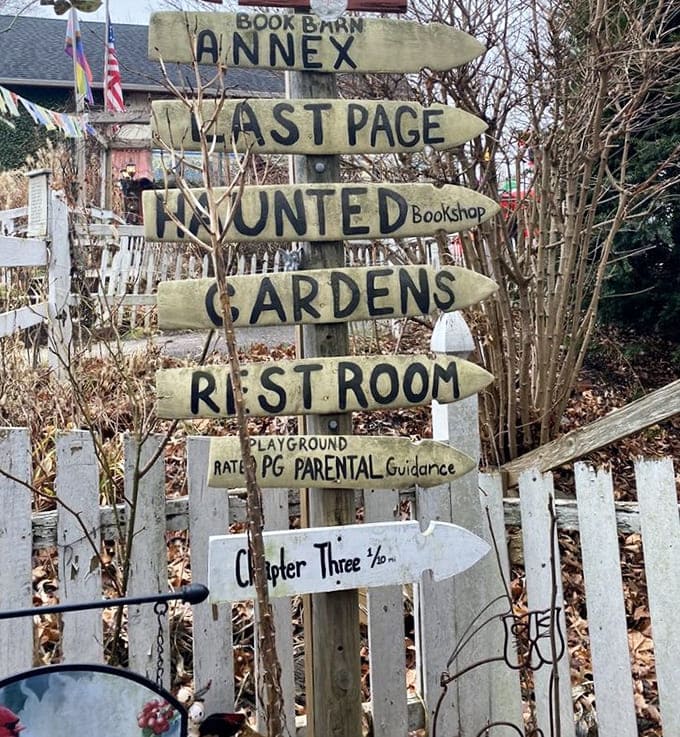 This directional signpost isn't just functional&mdash;it's a roadmap to literary adventures, each arrow pointing to a new reading journey.