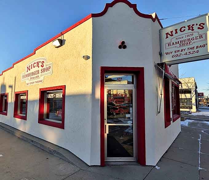 The corner entrance invites you into a world where burger simplicity has been perfected through decades of consistent excellence.