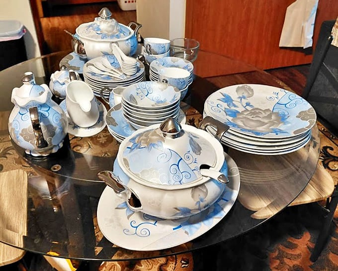 Delicate blue and white china service waits patiently for its next dinner party. Someone's wedding registry from 1965 becomes another's entertaining treasure.