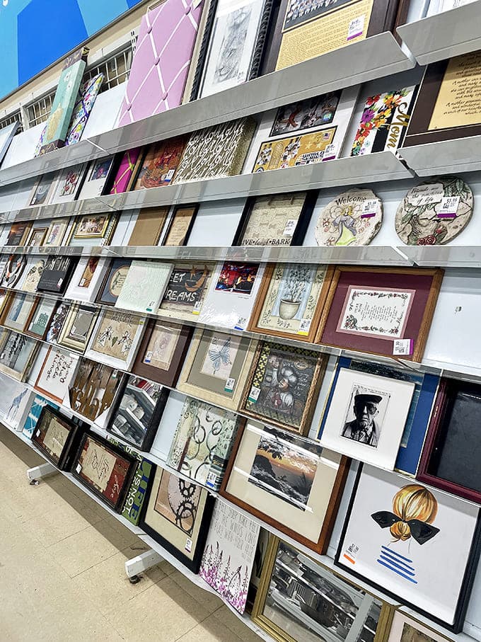 A wall of framed possibilities&mdash;because nothing says "cultured home" like art you didn't have to pretend to understand at a gallery.