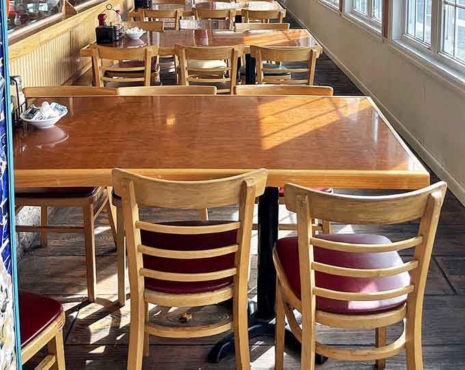 Wooden tables bathed in morning light invite you to linger over coffee and conversation &ndash; breakfast's natural habitat.