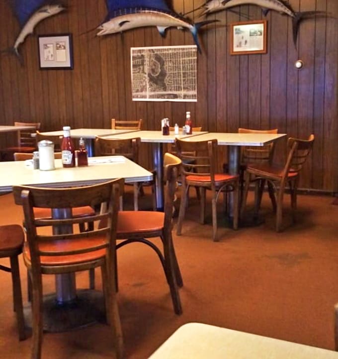 Wood-paneled walls and simple furnishings create the perfect backdrop for food that doesn't need fancy surroundings to shine.