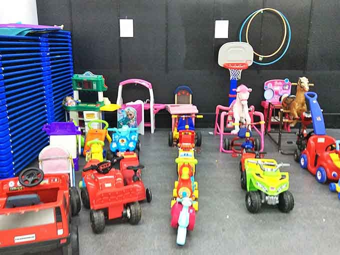 Childhood on wheels! This colorful armada of ride-on toys stands ready to create memories for a new generation of backyard adventurers.