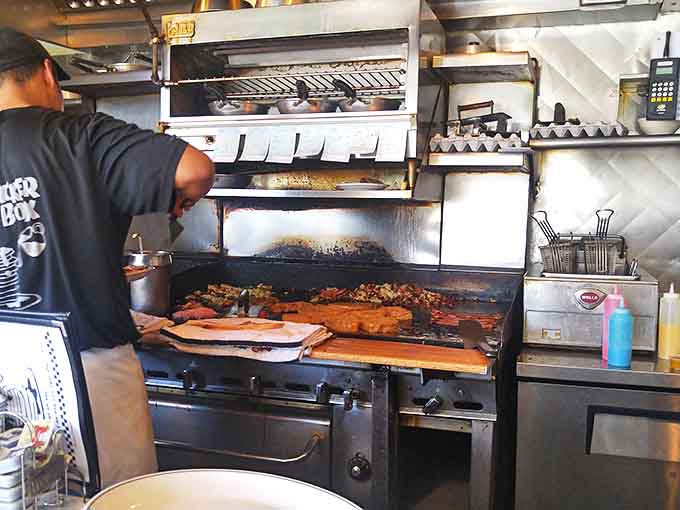 The kitchen's sizzling flat-top – where breakfast dreams are forged in butter and bacon grease by skilled hands.