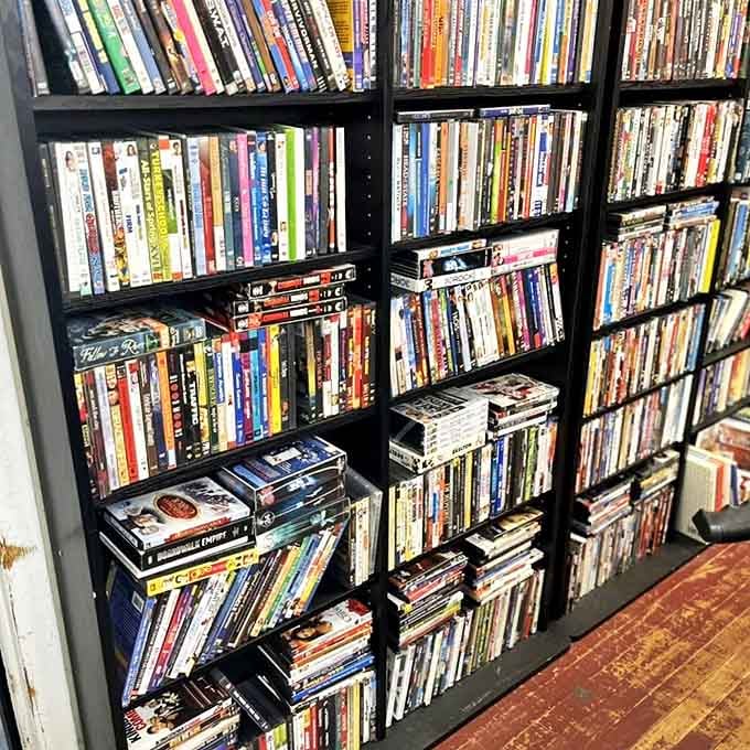 DVD shelves packed tighter than a Netflix server, offering physical media pleasures in an increasingly digital world.