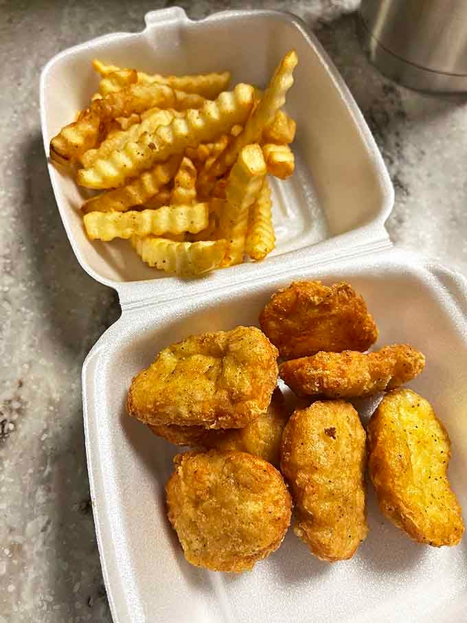 Golden fries and nuggets nestled in their paper boats&mdash;simple pleasures that remind us why sometimes the best dining experiences don't require tablecloths or reservations.