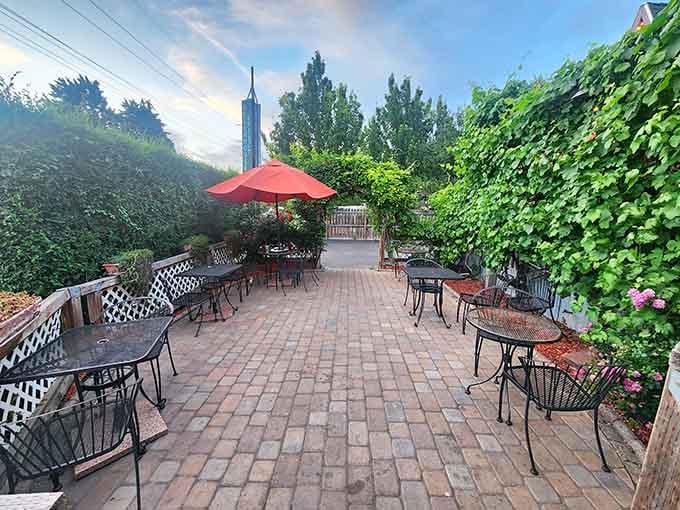 The secret garden patio &ndash; where ivy-covered walls create a green oasis that makes your coffee break feel like a mini-vacation.