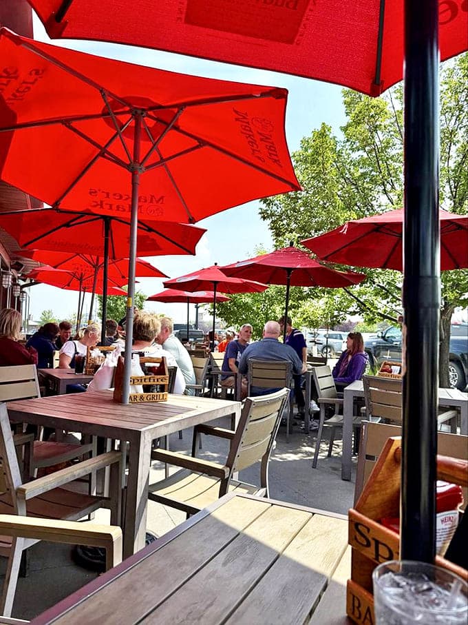 Patio dining under those signature red umbrellas &ndash; where summer evenings stretch into night and nobody's in a hurry to leave.