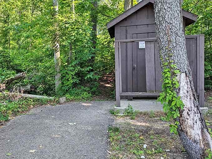 The humble trailhead facilities&mdash;practical, rustic, and perfectly suited to their surroundings. Civilization's small concession to comfort amid wilderness.