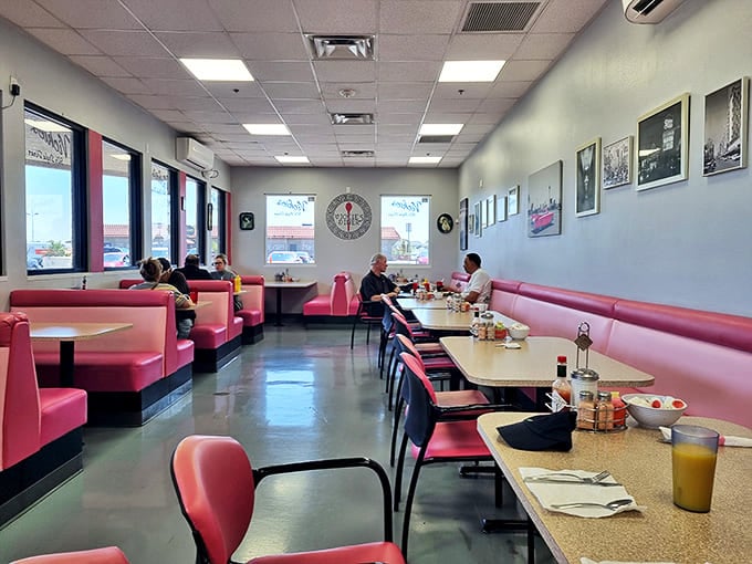 Pink booths and formica tables &ndash; the stage where countless Vegas breakfast dramas have unfolded, one refill at a time.
