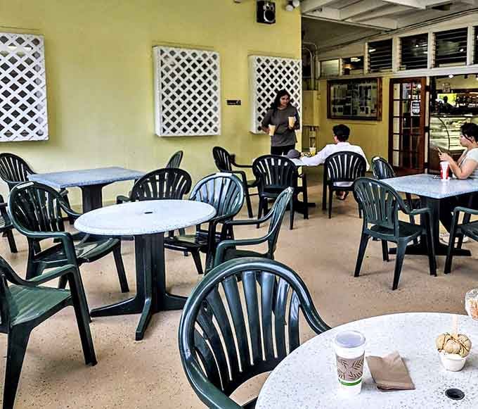 The seating area offers that perfect "I'm in Hawaii" vibe without trying too hard&mdash;simple tables where extraordinary flavors create lasting memories.