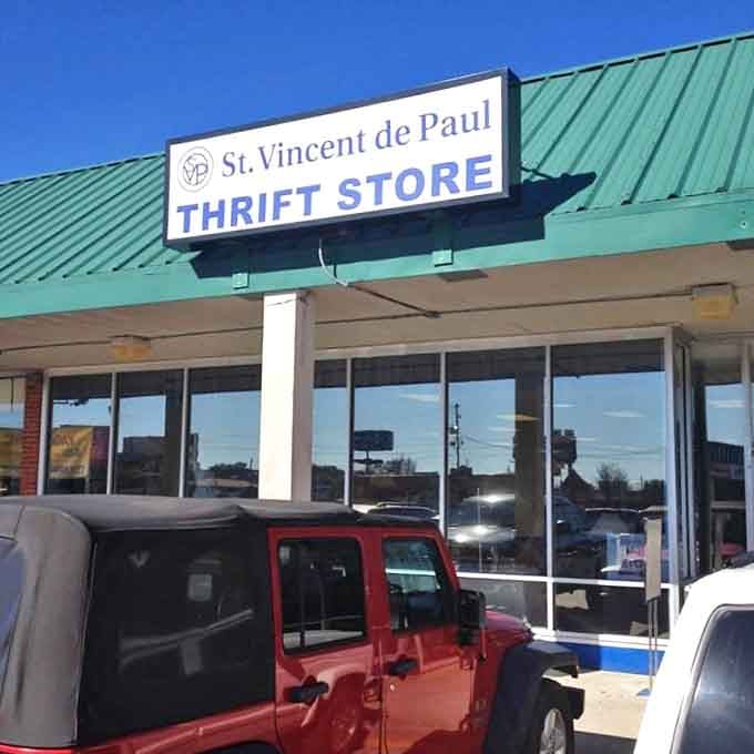 The iconic green-roofed St. Vincent de Paul Thrift Store in Pensacola welcomes bargain hunters with its no-frills charm and promise of hidden treasures.