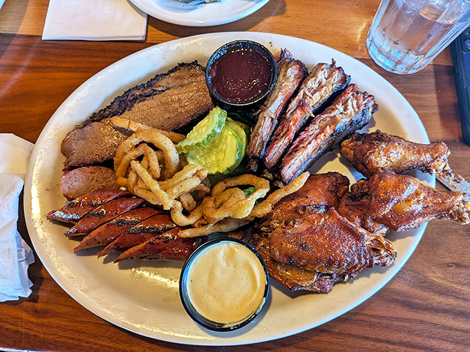 The carnivore's dream plate &ndash; a symphony of smoke, spice, and tenderness featuring ribs, brisket, and chicken. Resistance is futile.