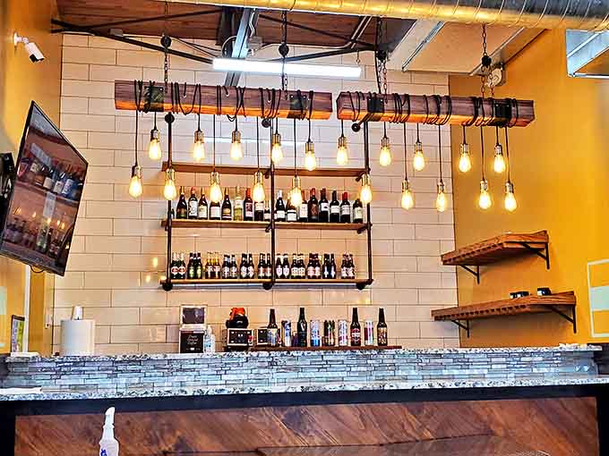Edison bulbs dangling above a bar stocked for brunch cocktails&mdash;because sometimes pancakes need a mimosa companion.