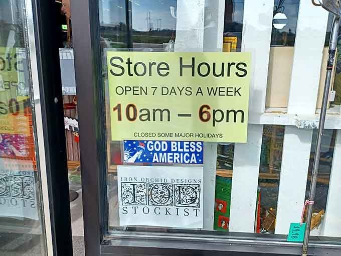 Open seven days a week&mdash;because treasure hunting waits for no weekend. The "God Bless America" sign is pure Wisconsin hospitality.