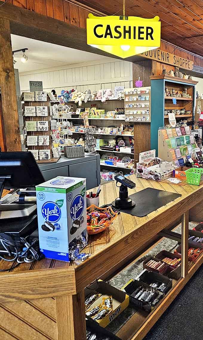 The cashier area doubles as a souvenir shop, because after experiencing those mashed potatoes, you'll want a memento of the magic.