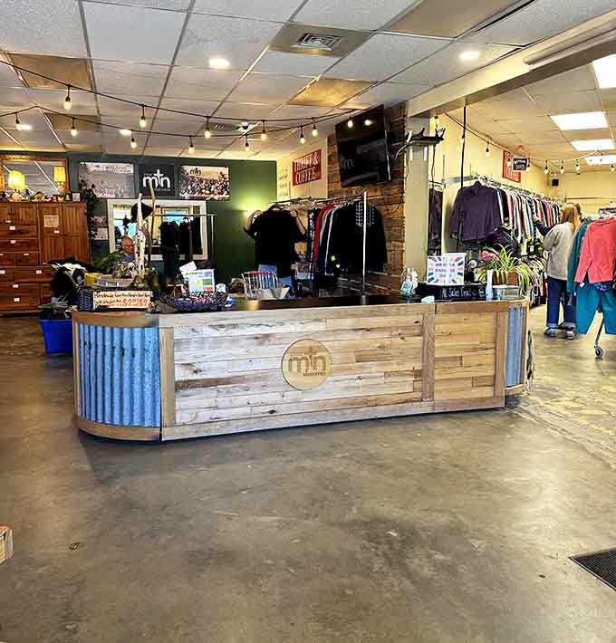 The rustic checkout counter combines mountain charm with practicality &ndash; like a lumberjack who's also surprisingly good at interior design.