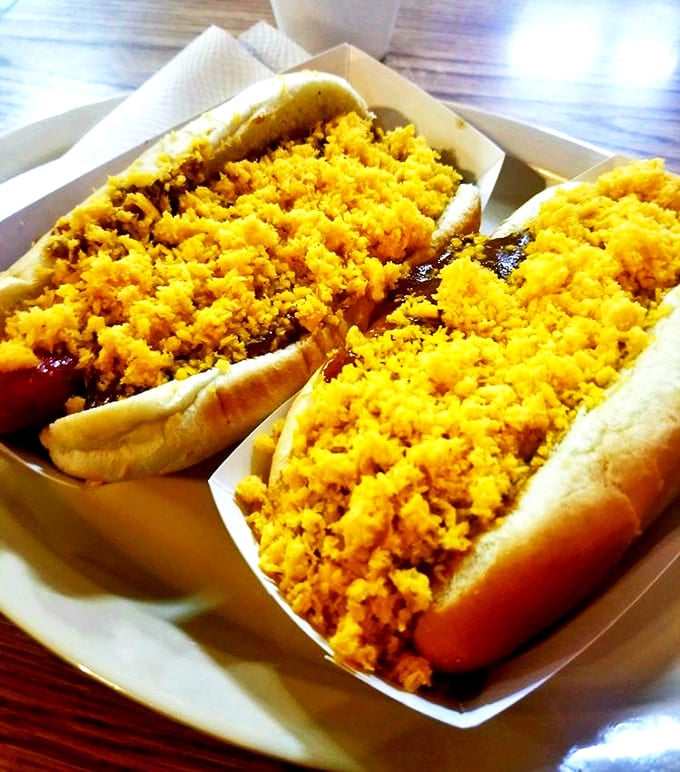 Chili dogs topped with a mountain of cheese &ndash; the kind of indulgence that requires extra napkins and absolutely zero regrets.