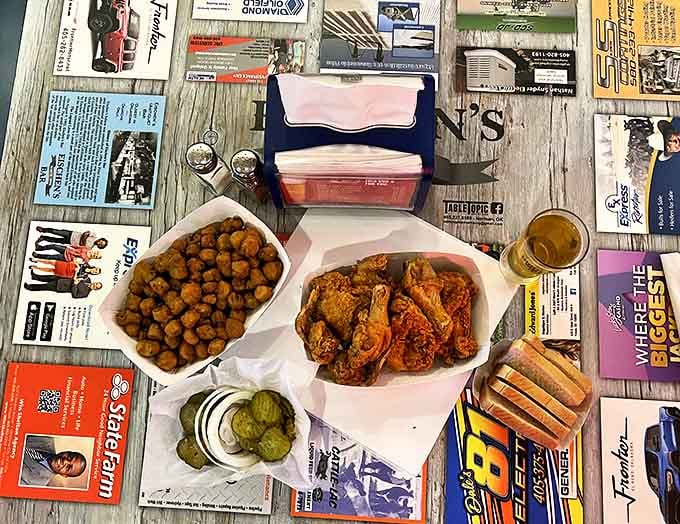 The complete Eischen's experience laid bare &ndash; fried chicken, okra, pickles, and beer. A table setting that says "welcome to Oklahoma" without saying a word.