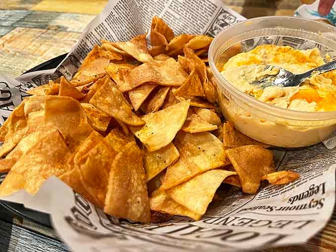 This crab dip isn't just a starter&mdash;it's the beginning of a beautiful friendship between seafood and tortilla chips that ends only with an empty container.