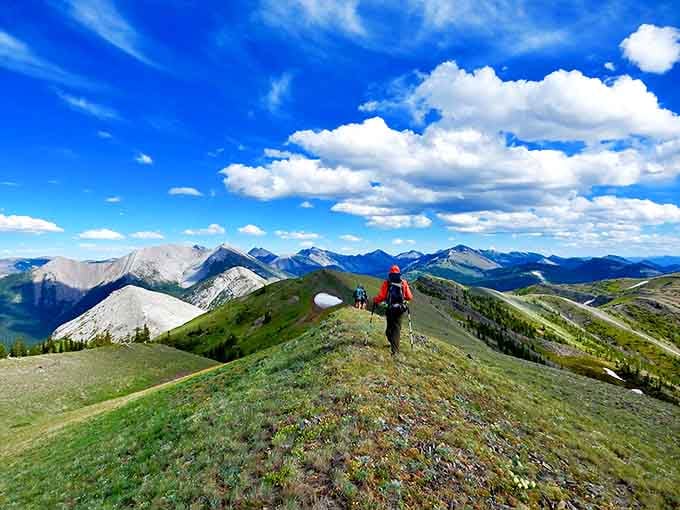 The trail beckons hikers toward horizons that stretch forever, proving Montana's nickname "Big Sky Country" is the understatement of the century.