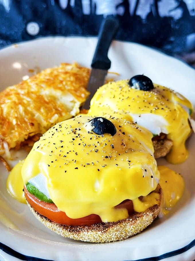 Eggs Benedict that would make a brunch enthusiast weep with joy &ndash; that hollandaise sauce is practically glowing with buttery goodness.