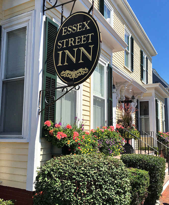 The Essex Street Inn's flower boxes burst with color against classic clapboard &ndash; quintessential New England charm with a side of hospitality.