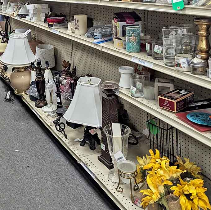 Lamp lovers' paradise where vintage meets value. Those yellow silk flowers are either hideous or exactly what your side table needs.