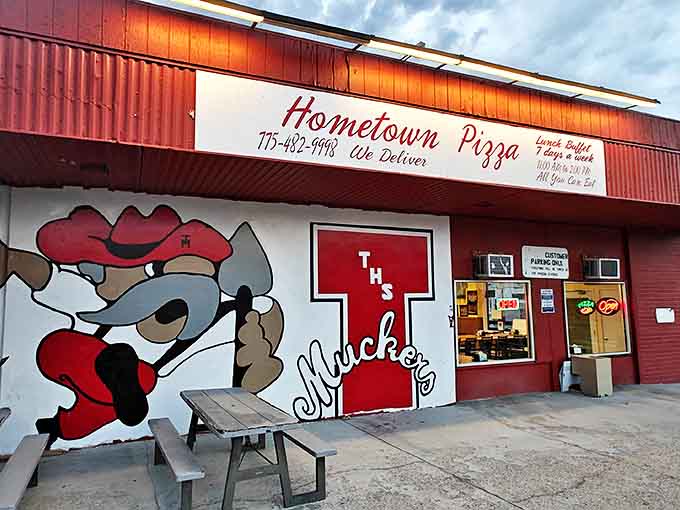 Hometown Pizza, where the cartoon mascot might be winking, but the serious pizza business inside is no joke.