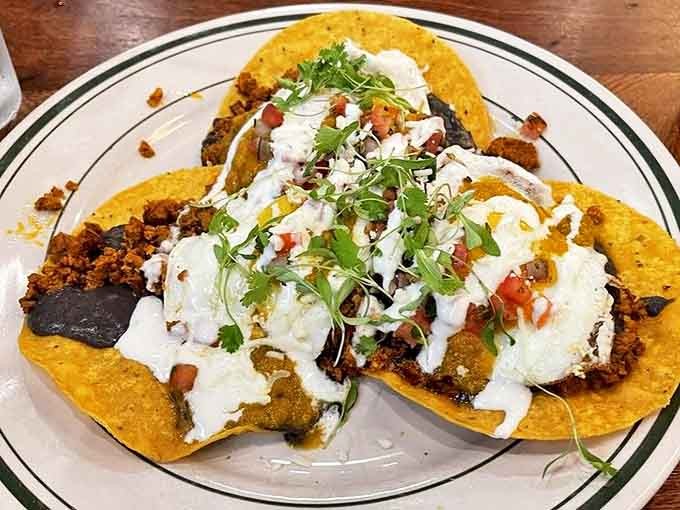 These huevos rancheros look like they're dressed for a fiesta &ndash; a colorful celebration that your taste buds are definitely invited to.