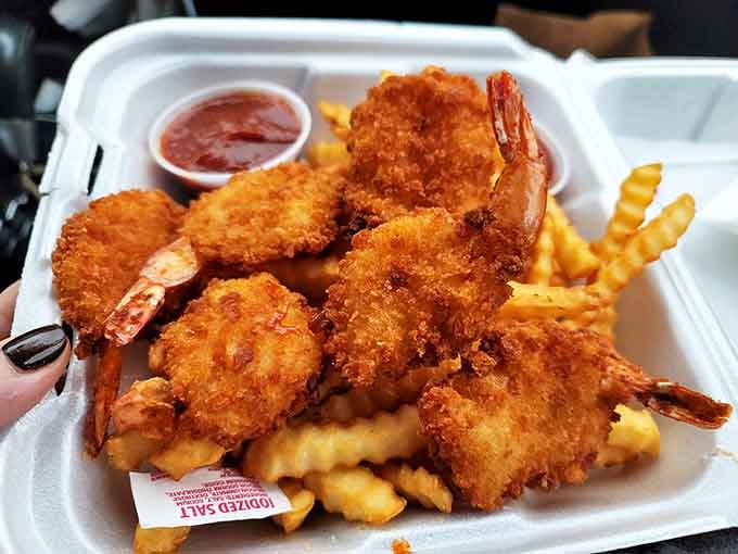 These golden prawns aren't just fried&mdash;they're transformed. Perched atop crinkle-cut fries like treasures from a delicious sea, they're worth every mile of the journey.