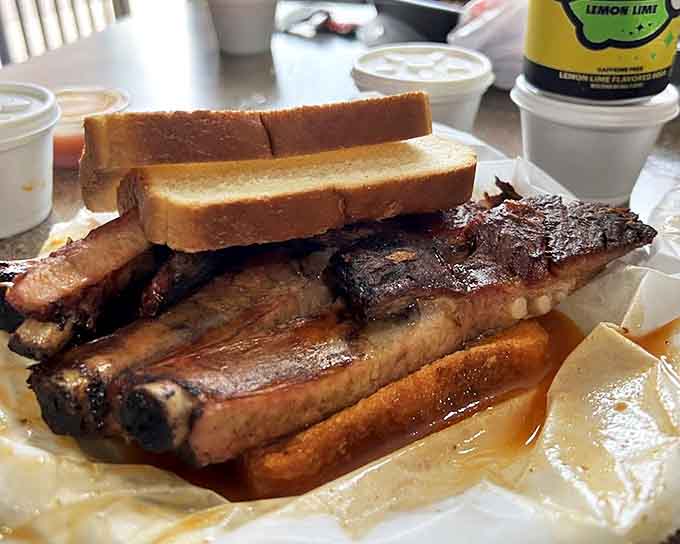 A sandwich that requires both hands, several napkins, and a moment of silent appreciation. Architecture of deliciousness on white bread.