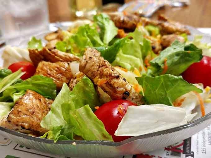 A salad that actually deserves its place at the table&mdash;crisp greens, juicy tomatoes, and grilled chicken that wasn't an afterthought.