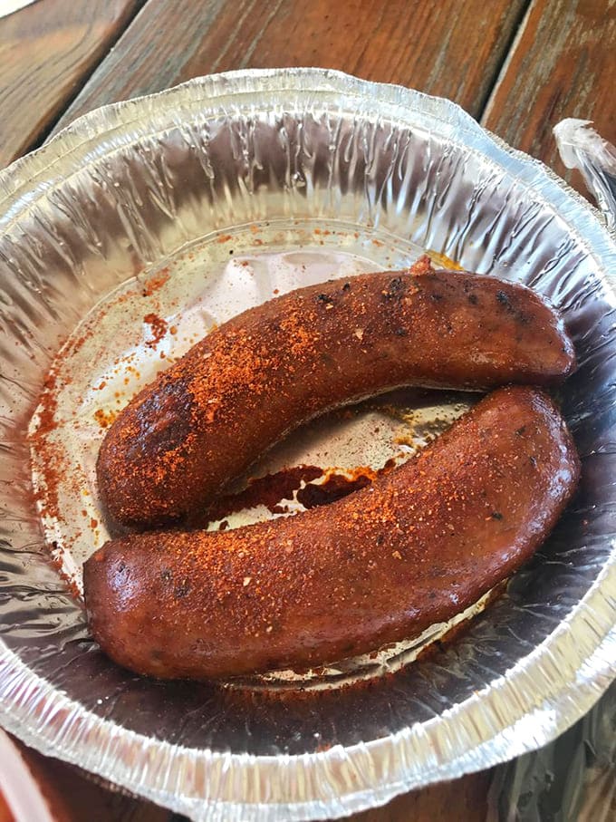 Sausages with a deep mahogany color that signals spice, smoke, and everything nice. These links are missing no chains.