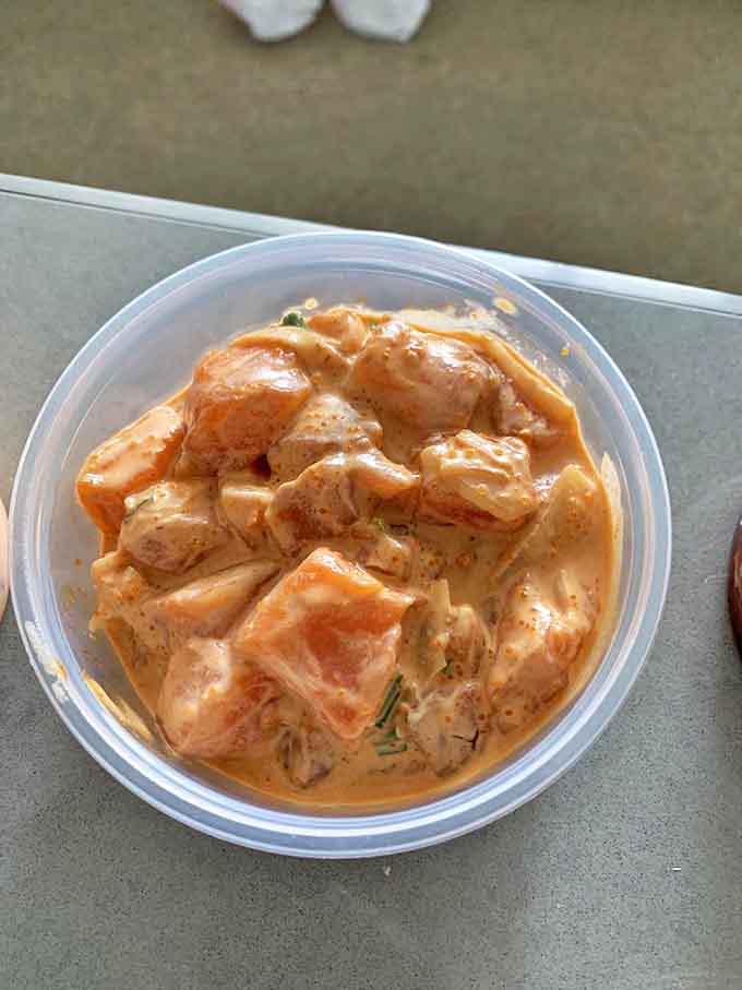 This spicy salmon poke proves that ahi isn't the only fish in the sea worthy of the poke treatment—a creamy, coral-colored delight.