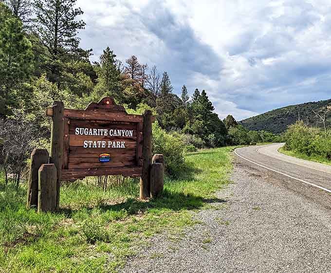 Sugarite Canyon State Park's entrance sign promises outdoor adventures just minutes from downtown, where nature remains wonderfully unspoiled.