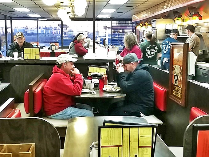These booths have heard more local news, family stories, and friendly debates than any social media platform could ever hope to capture.