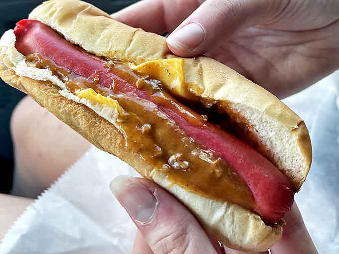 This isn't just a hot dog&mdash;it's a perfectly engineered flavor delivery system, where the bright red frank peeks out to announce its delicious presence.